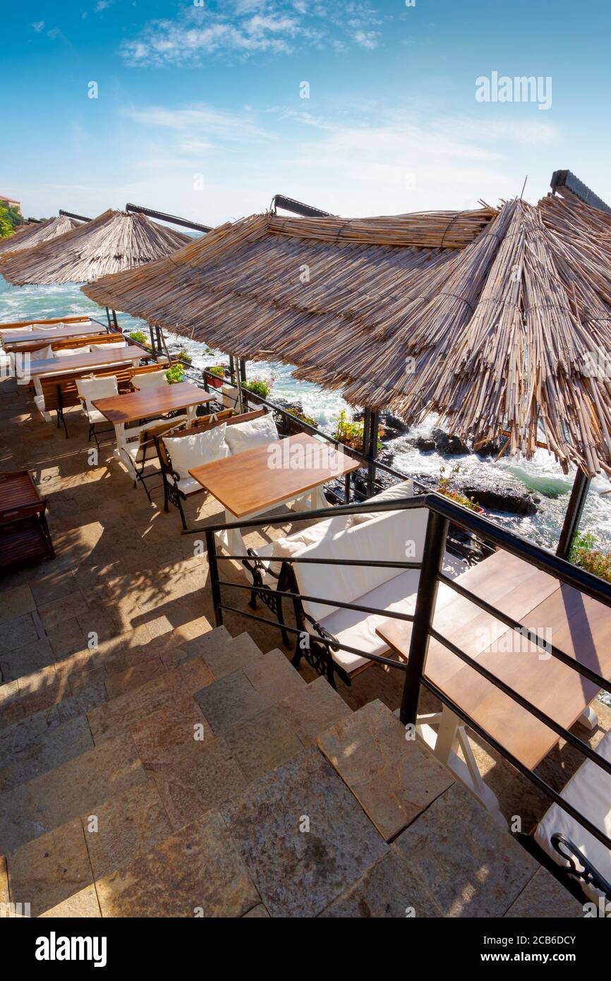 empty terrace of a restaurant on the sea. beautiful view in to the bay ...