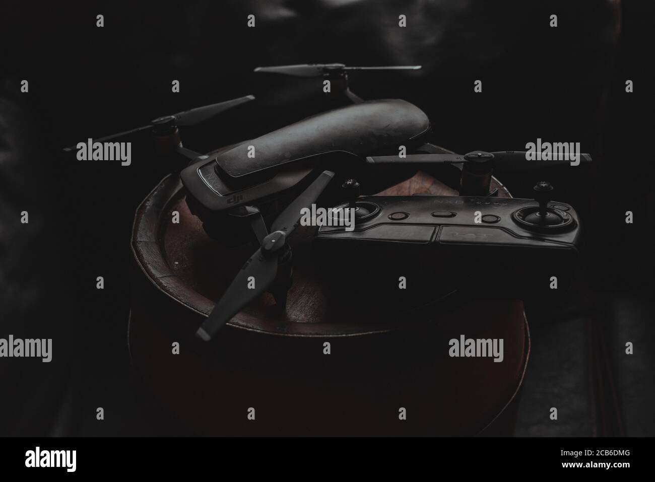 Black drone on a wine barrel in the dark room Stock Photo - Alamy