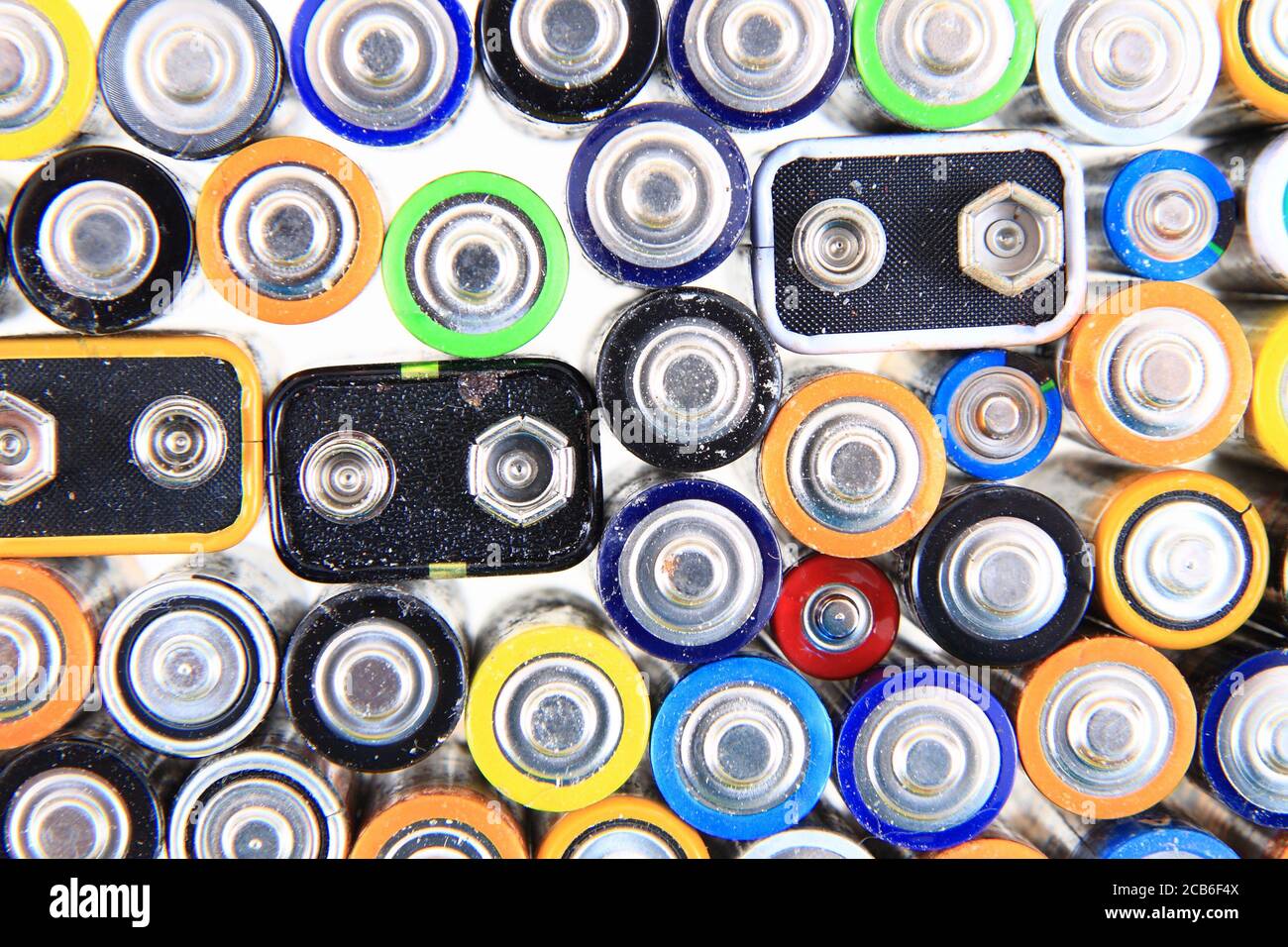 old color batteries texture as recycle background Stock Photo - Alamy
