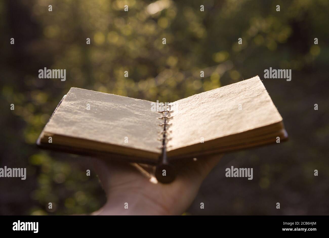 Opened old book hi-res stock photography and images - Alamy