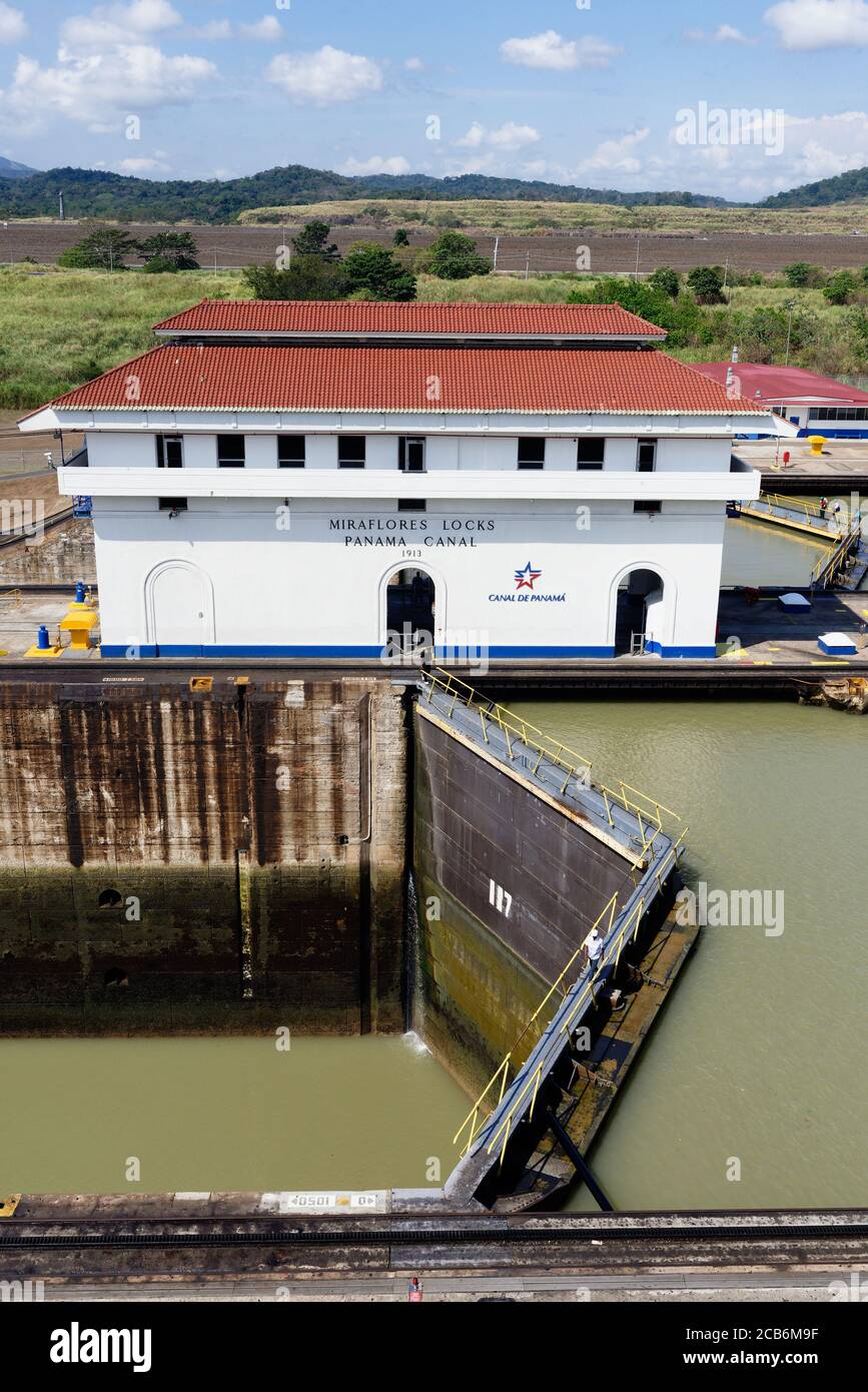 Engineer crossing the gates on the Miraflores Lock on the Panama Canal ...