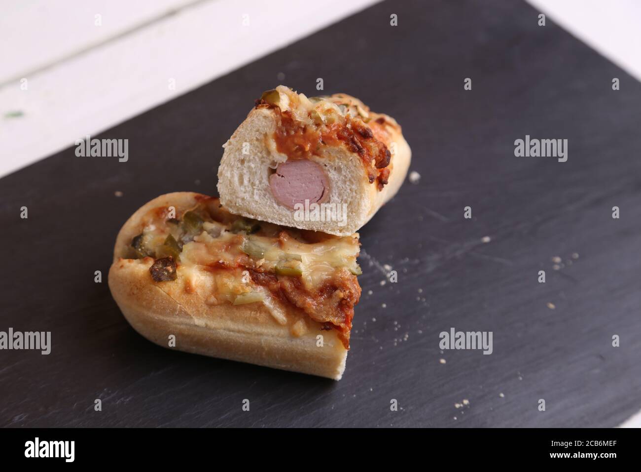 Closeup shot of delicious crispy hot dogs with melted cheese Stock ...