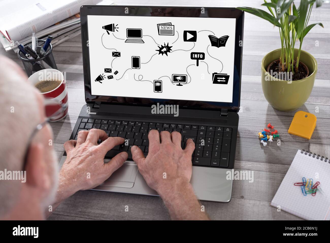 Communication media concept shown on a laptop used by a man Stock Photo ...