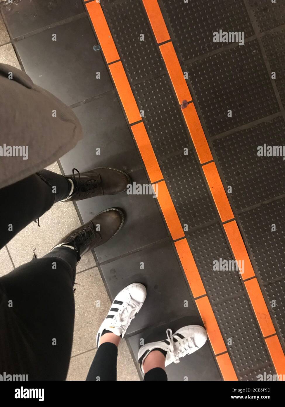 Standing on a NYC Metro Platform Stock Photo - Alamy