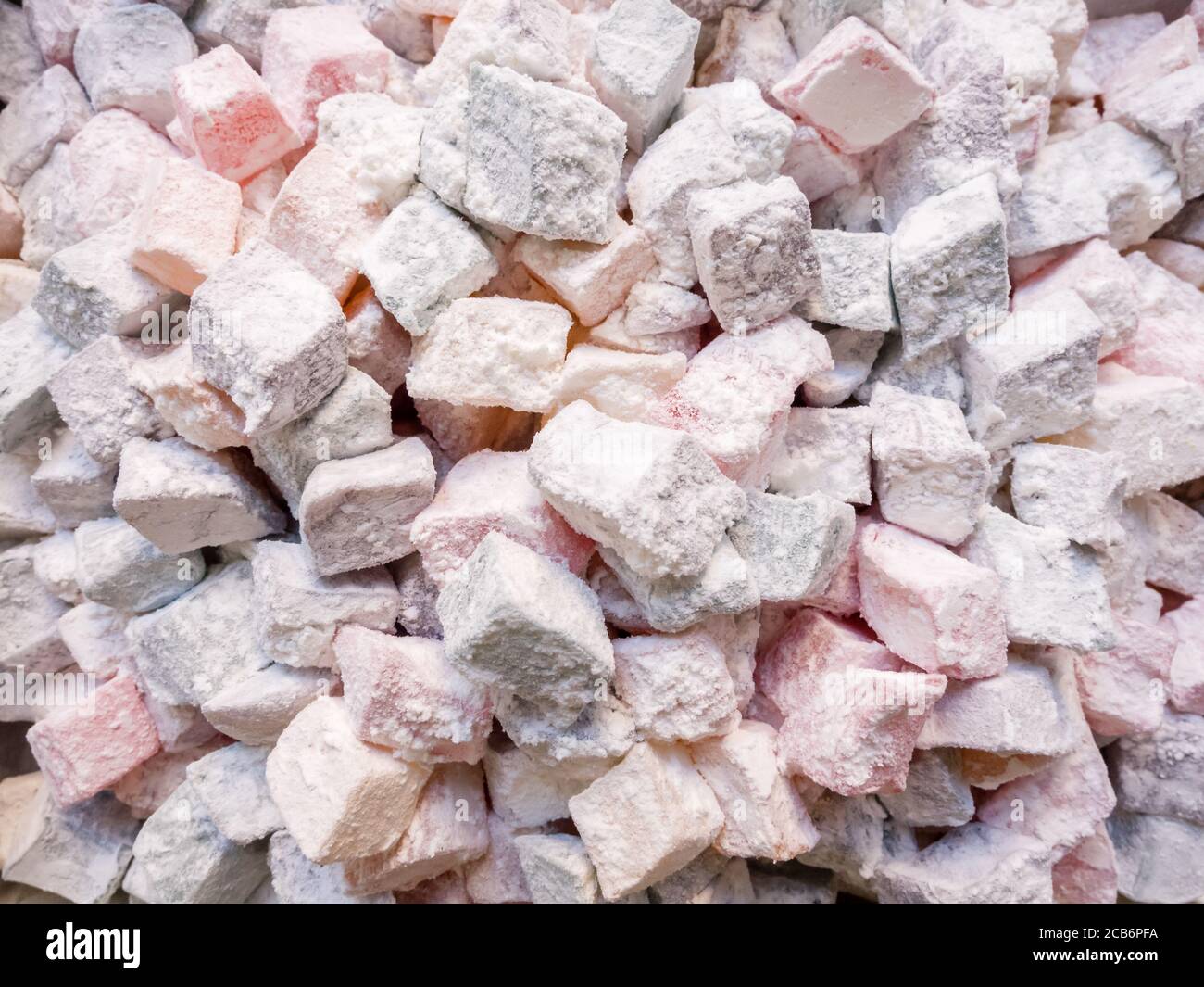 Small pieces of Turkish delight, Rahat lokum in powdered sugar ...