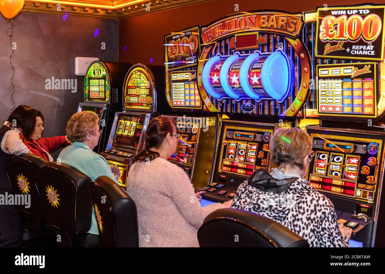 Customers using slot machines at a Cashino in Merry Hill Centre ...