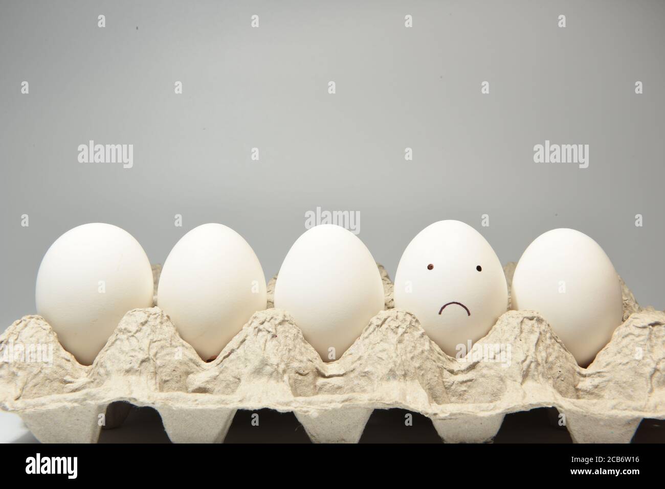 Sad and depressed face illustrated on an egg Stock Photo - Alamy