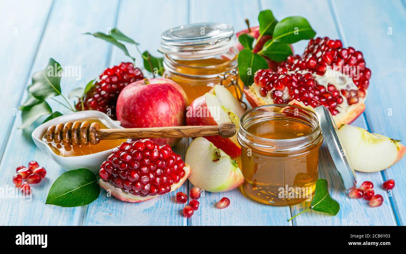 Rosh hashanah concept - honey, apples, pomegranate, symbols Stock Photo ...