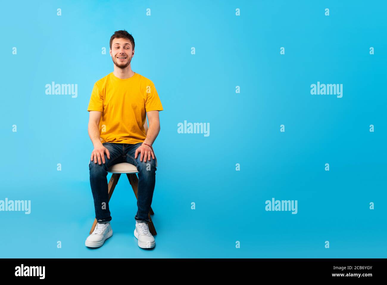 Male model sitting chair hi-res stock photography and images - Alamy