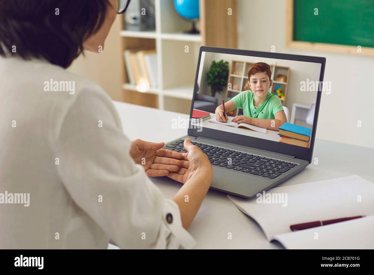 Education learning teaching online. The teacher teaches the child using ...