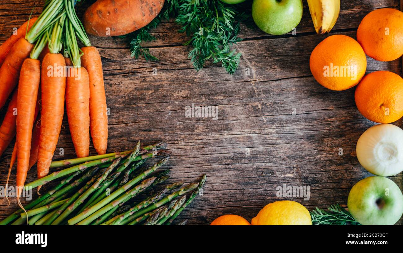 Healthy bio food ingredients frame background from above. Top view of ...