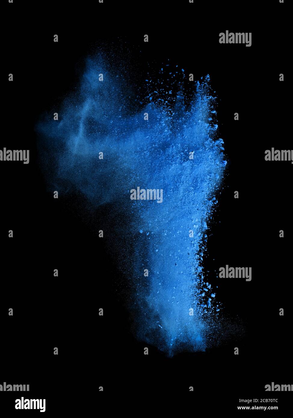 Freeze motion of blue dust explosion isolated on black background Stock ...