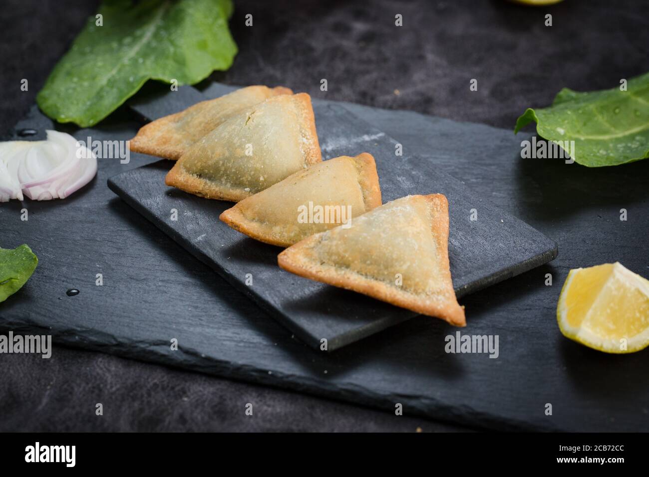 Veg Samosa - is a crispy and spicy Indian triangle shape snack which ...