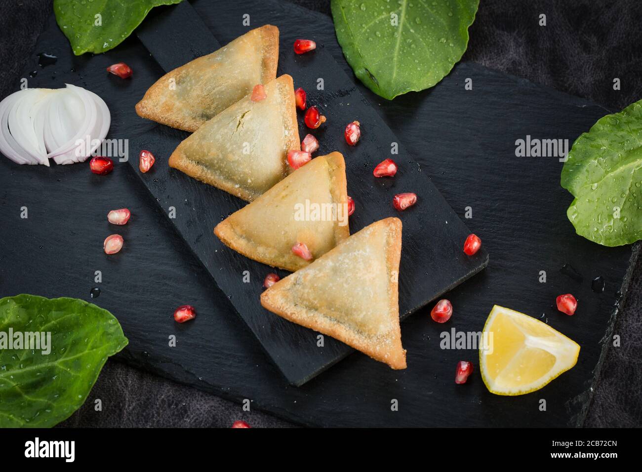 Veg Samosa - is a crispy and spicy Indian triangle shape snack which ...