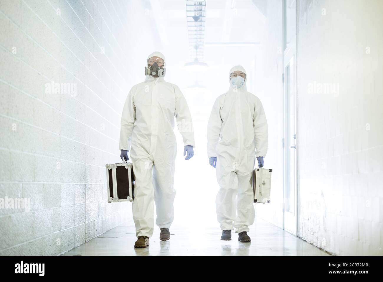 Corona virus concept. Two male scientist doctors in biochemical ...