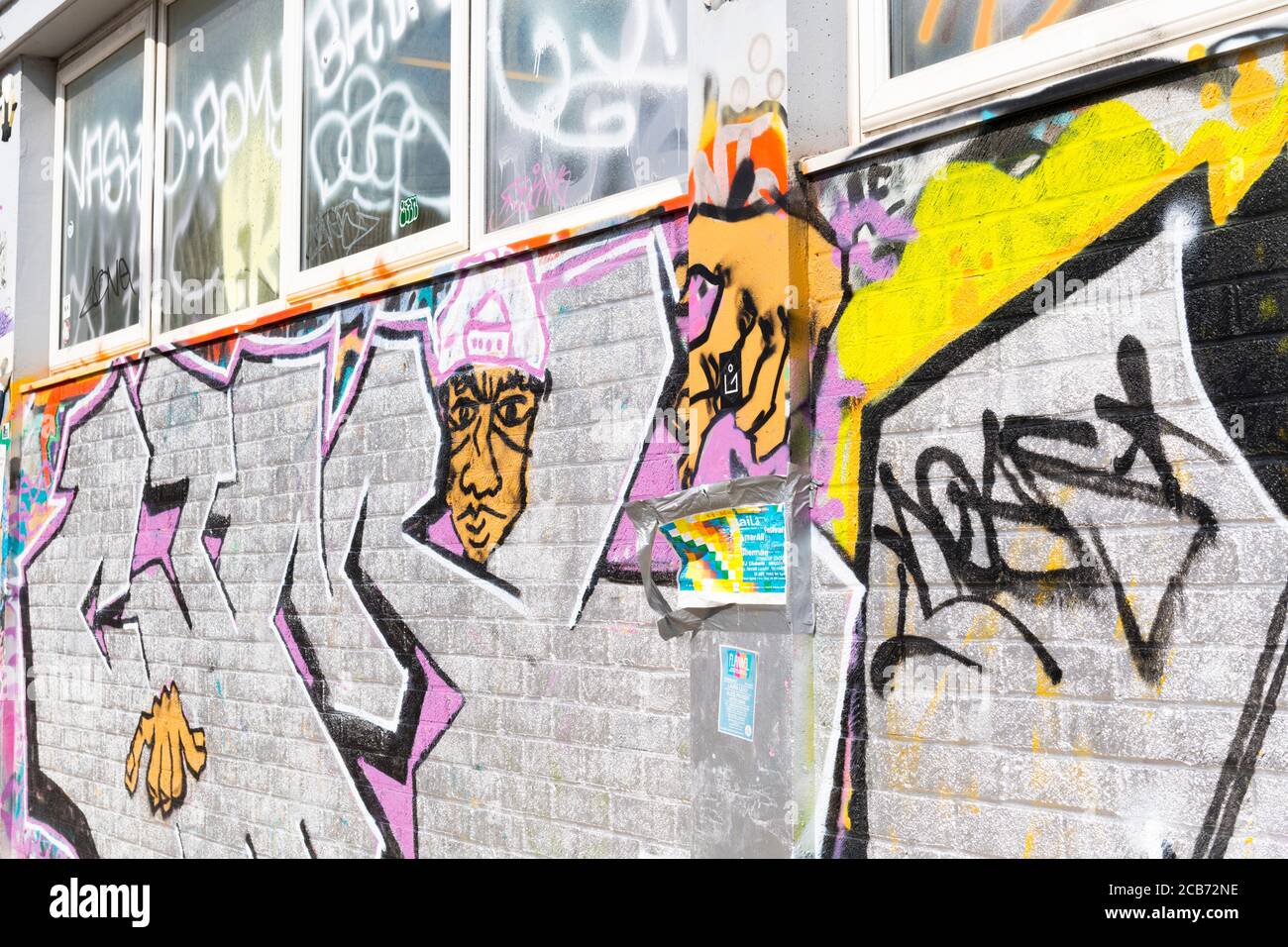 Red and yellow graffiti hi-res stock photography and images - Alamy
