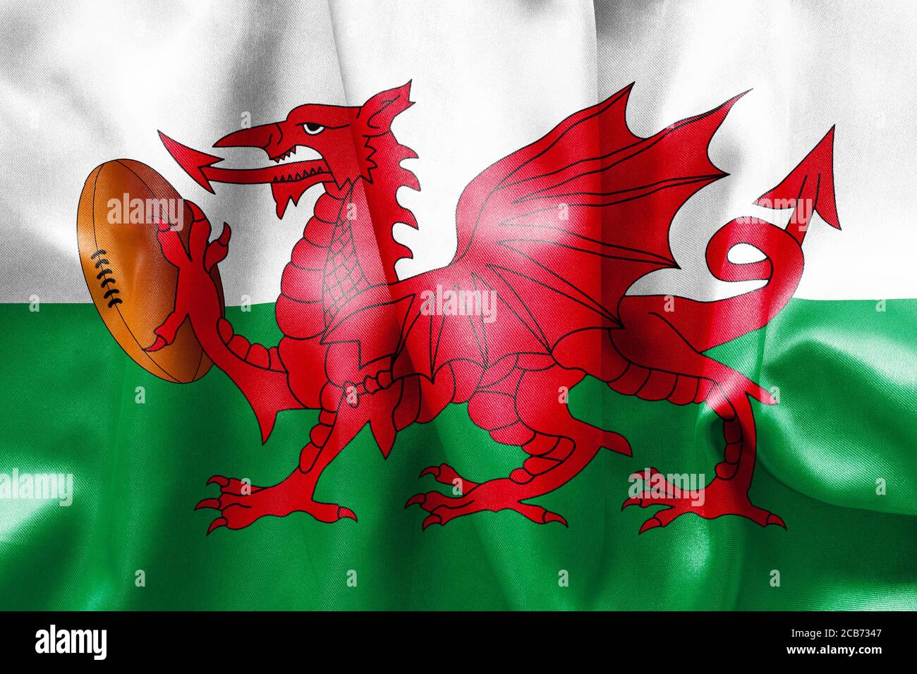 Welsh flag texture with a dragon holding a rugby ball Stock Photo - Alamy