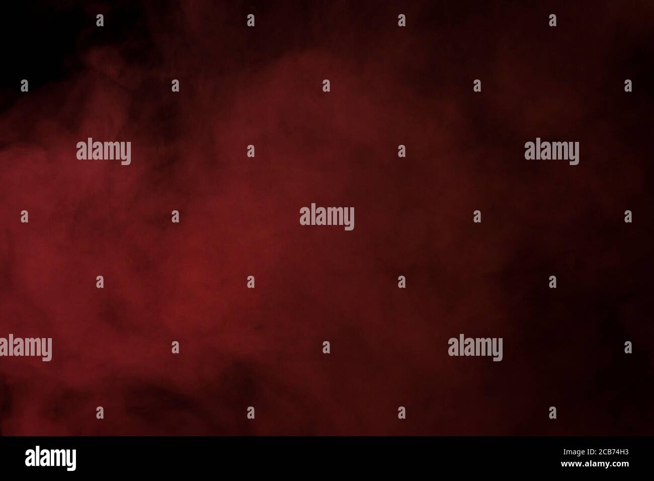 cloud of dense red vapor from an electronic cigarette concept of ...