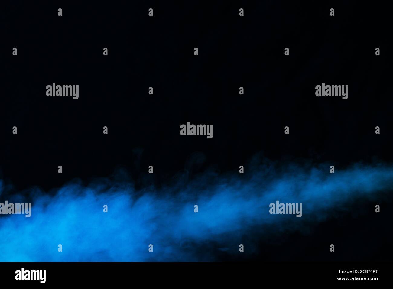 jet of steam from an electronic cigarette on a dark background The ...