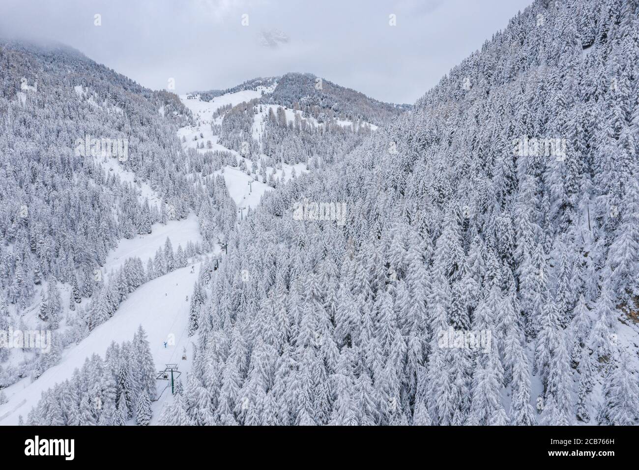 Beautiful aerial view of a ski resort and a village in a mountains ...