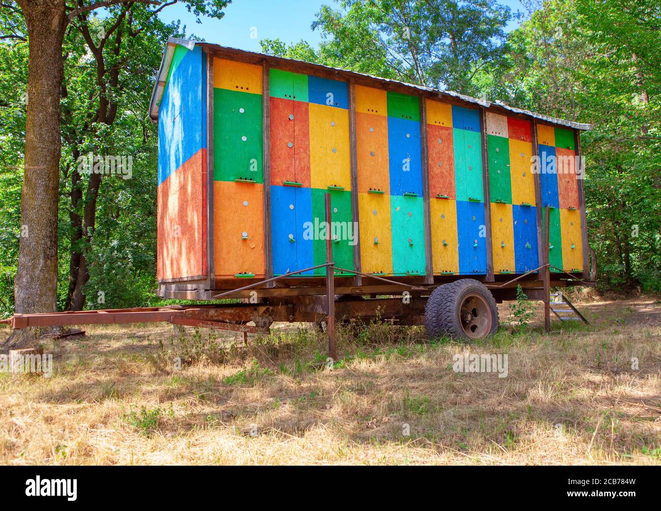 Colorful wagon with beehives . Mobile coach for honey production Stock ...