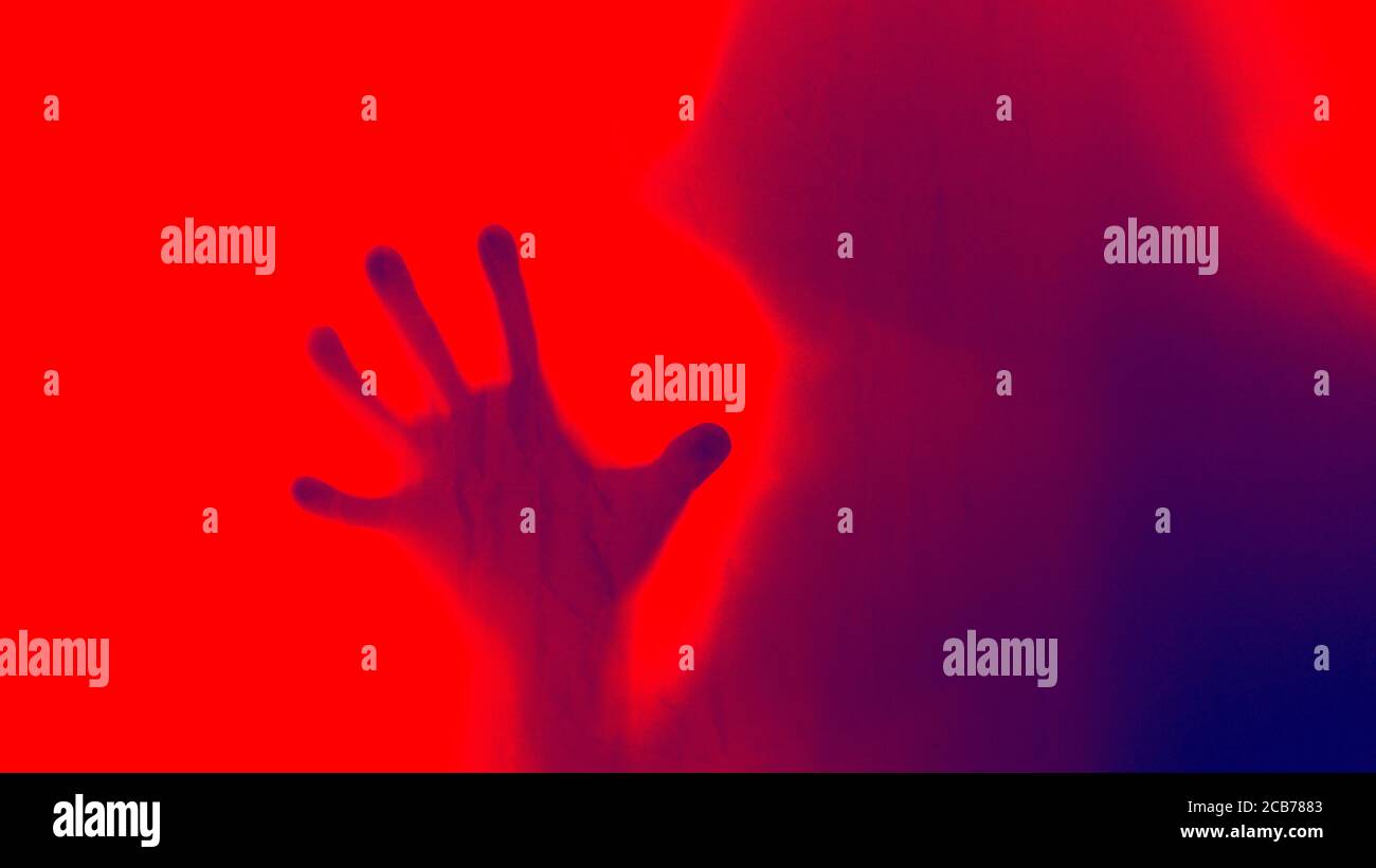 A ghostly hooded figure with a hand coming towards the camera. With a ...