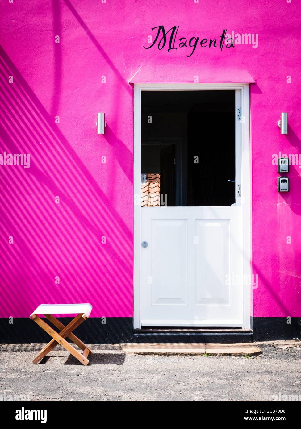 Magenta a colourful painted house in Aldeburgh Suffolk UK Stock Photo ...