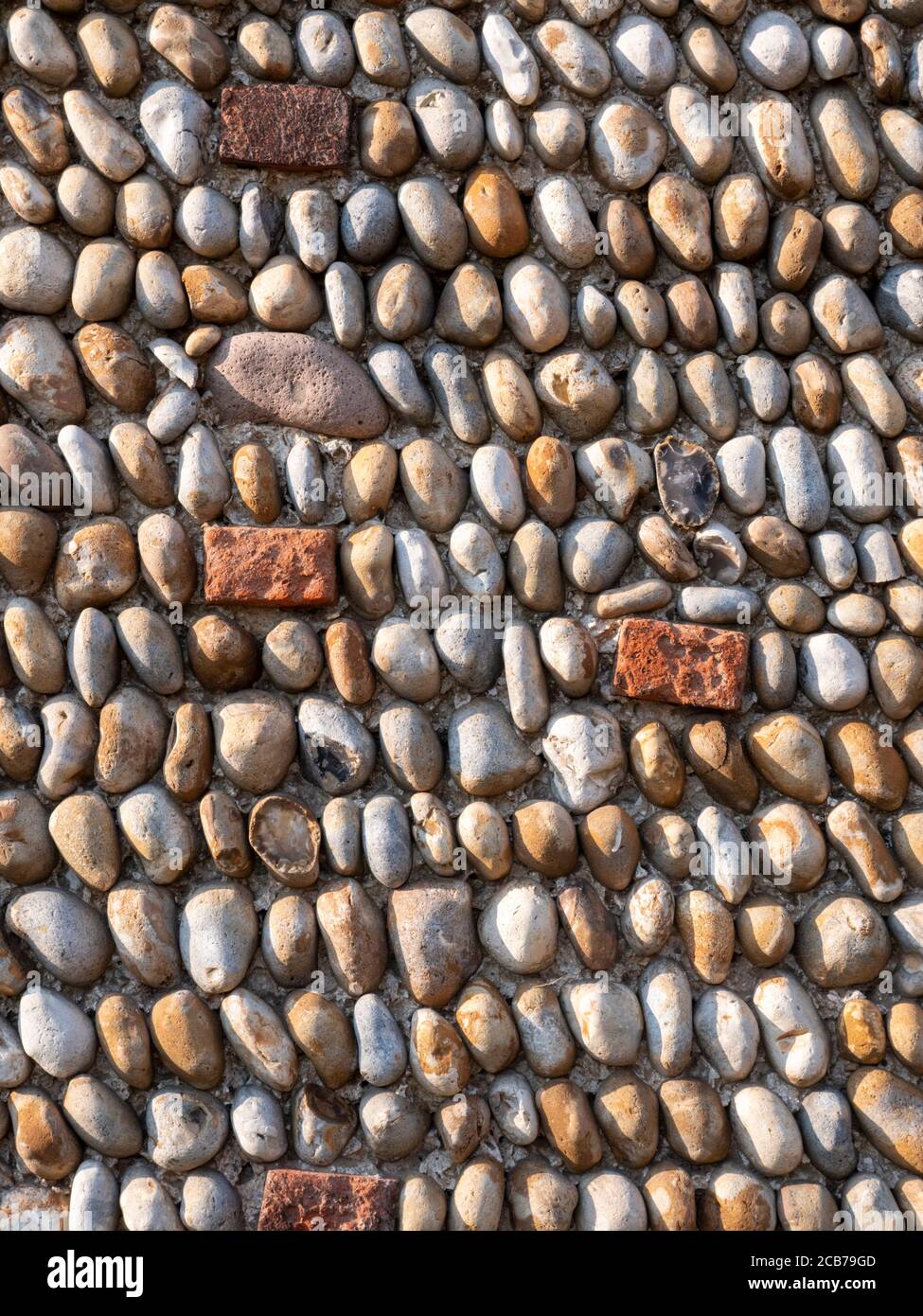 Flint pebbles on a wall of a house in Aldeburgh Suffolk UK Stock Photo ...