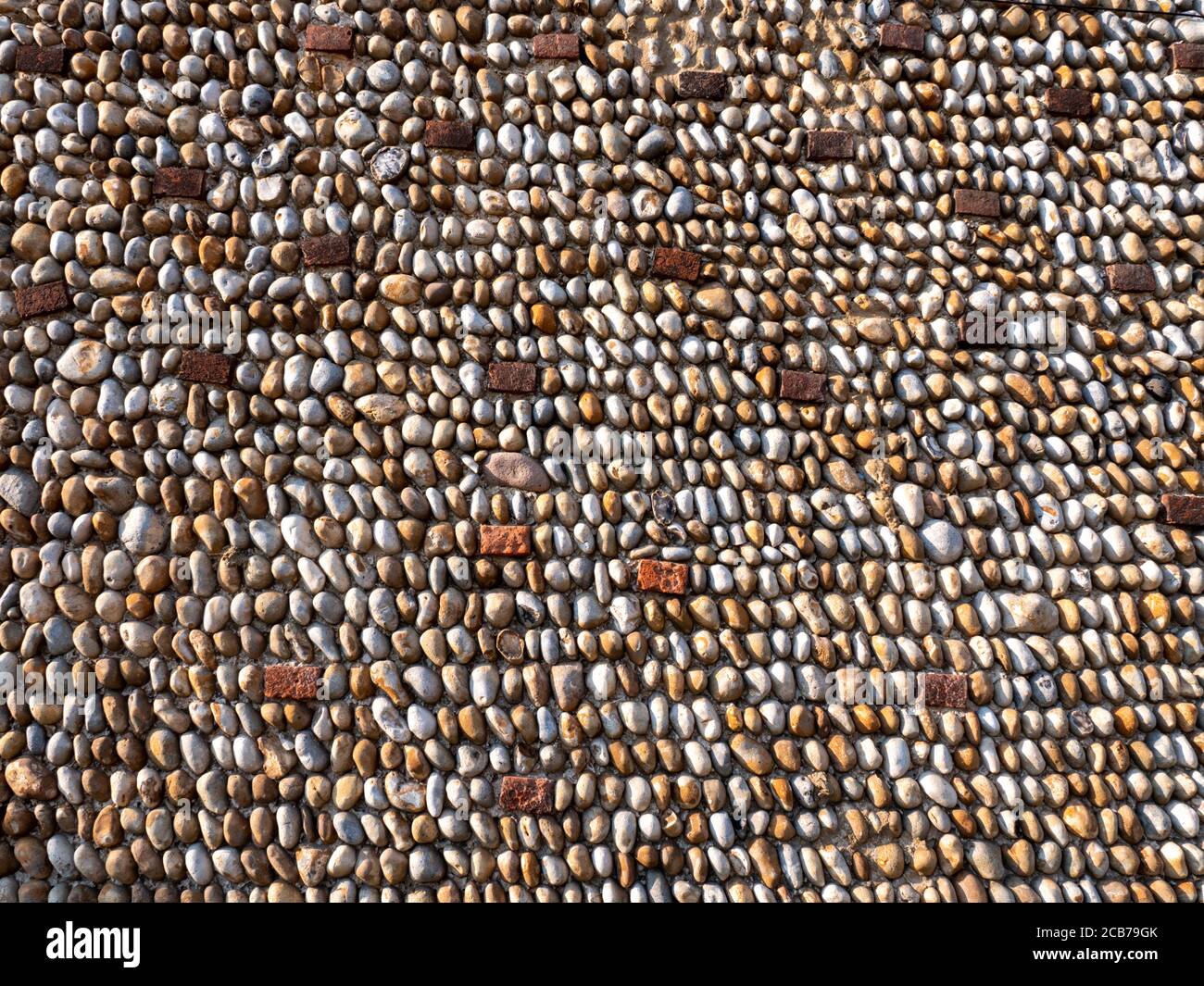Flint pebbles on a wall of a house in Aldeburgh Suffolk UK Stock Photo ...