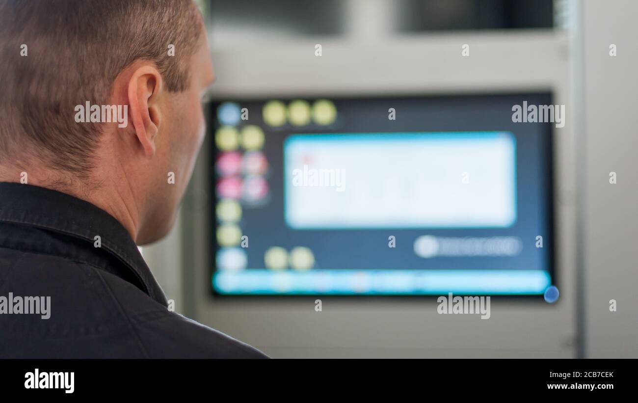 Close up of maintenance engineer testing medium voltage switchgear and ...