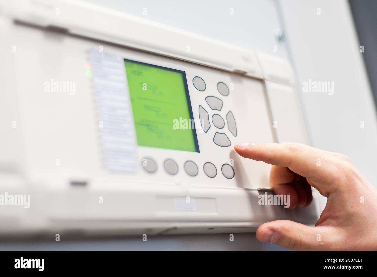 Close up of maintenance engineer testing medium voltage switchgear and ...