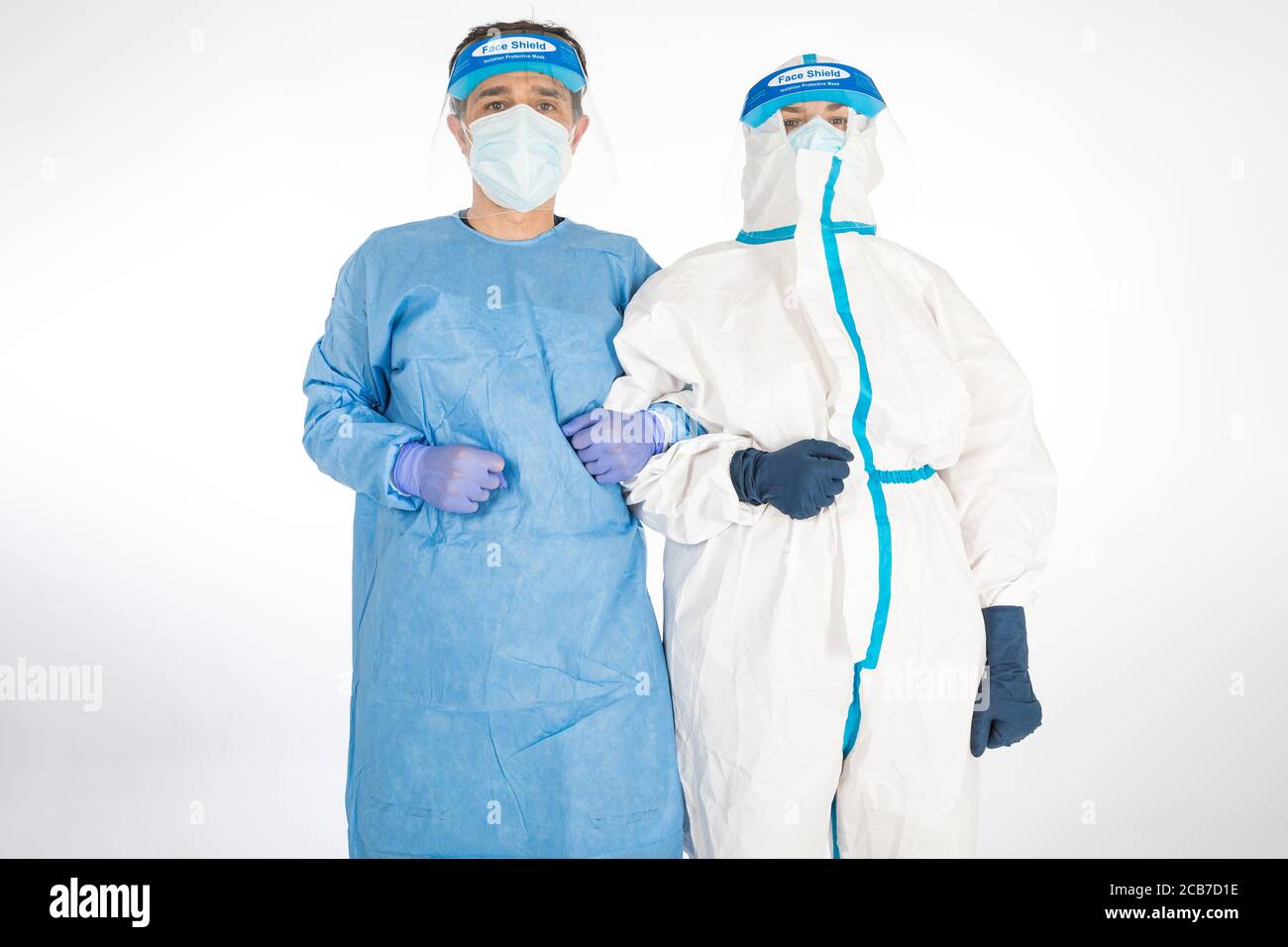 Man wearing PPE and Woman doctor wearing PPE to fight coronavirus ...