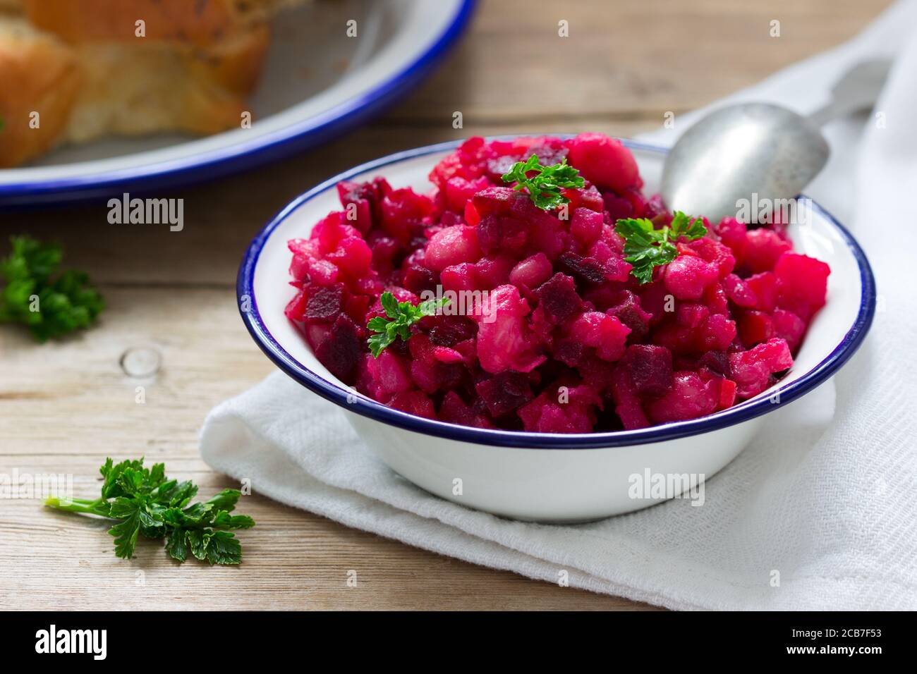 Traditional Russian lean vegetable salad vinaigrette in an iron bowl ...