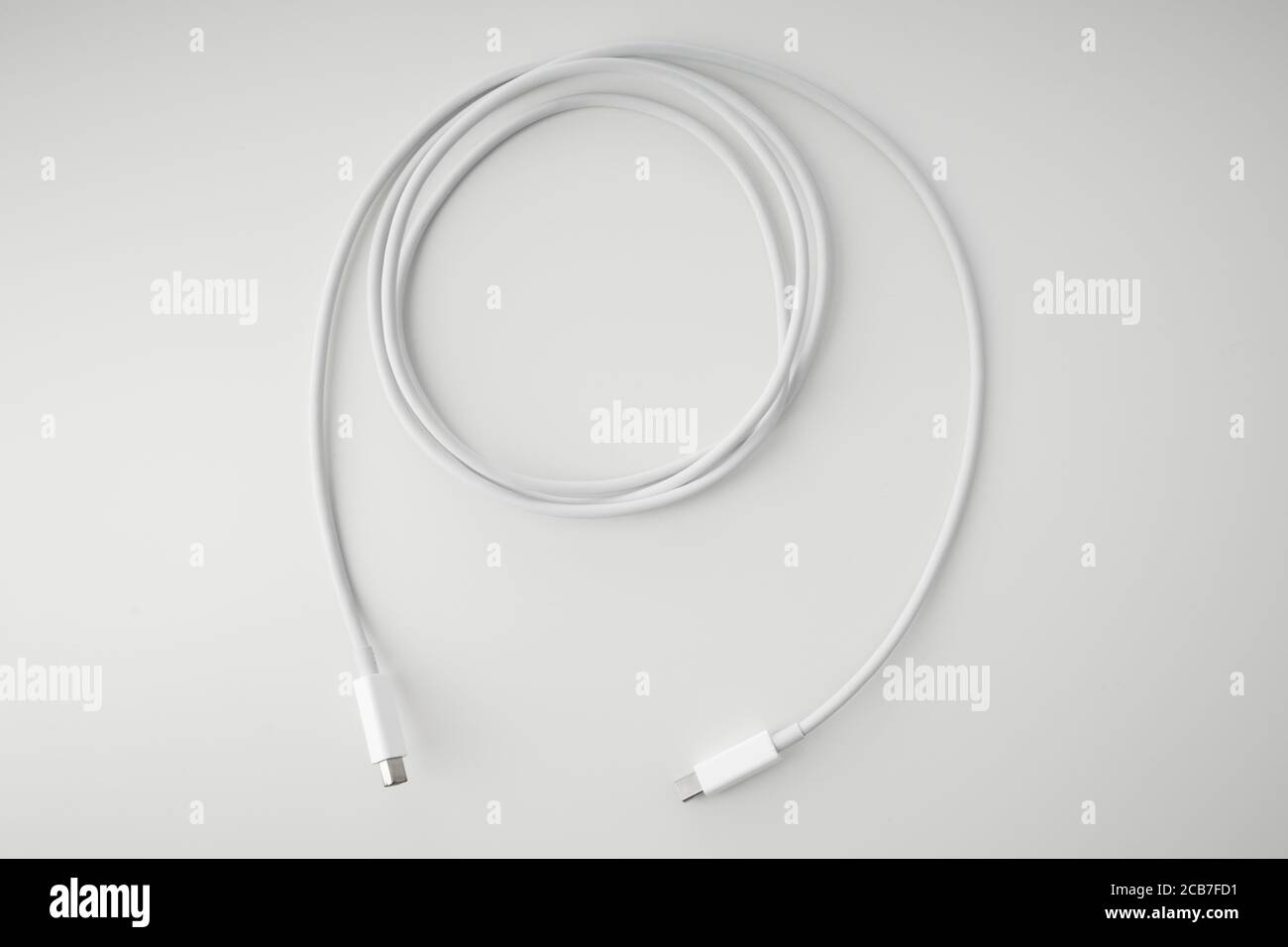 White wire cable isolated on a white background Stock Photo - Alamy