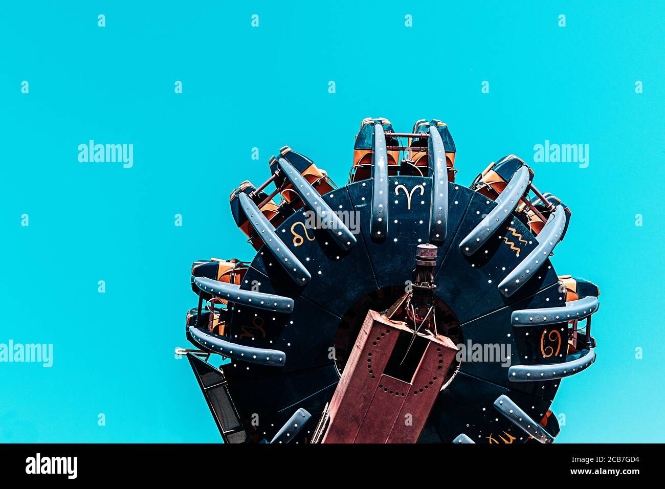 carousel "astrology" from the amusement park against the blue sky ...