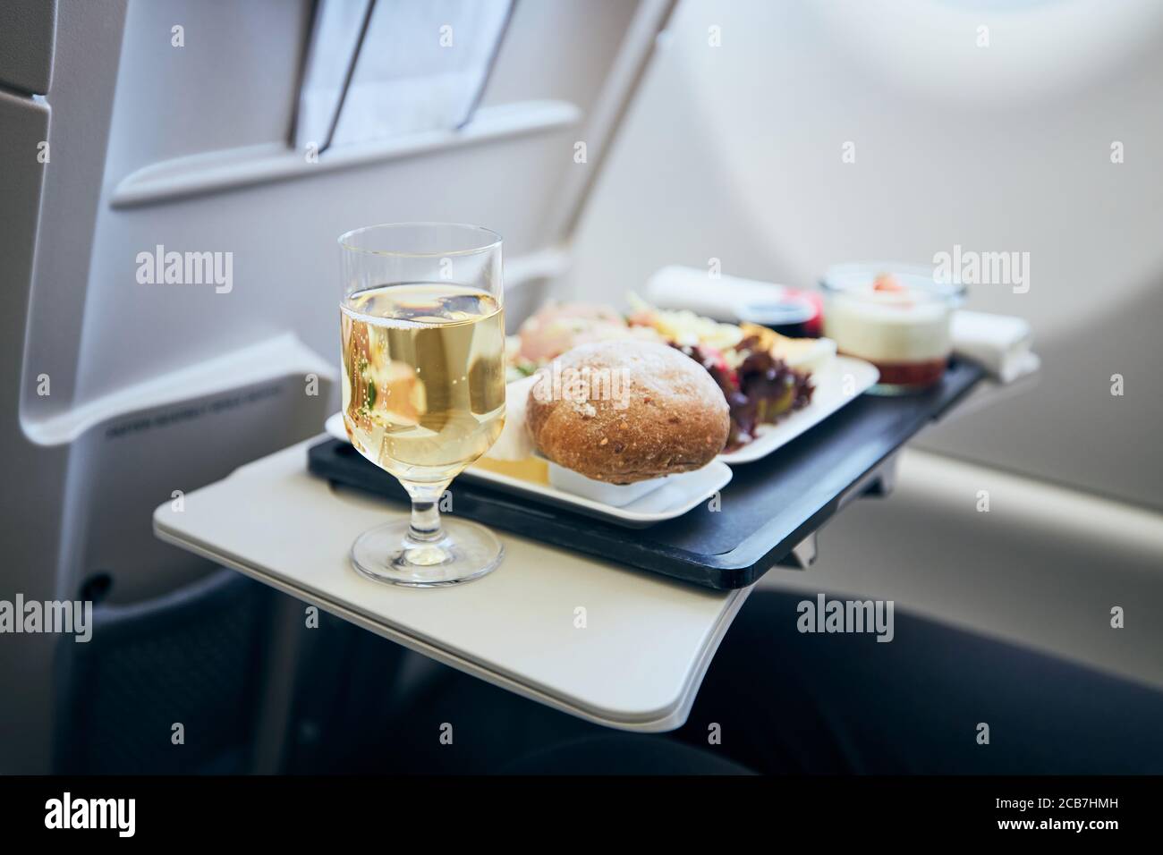 Airline meal and beverage served on seat tables during flight Stock ...
