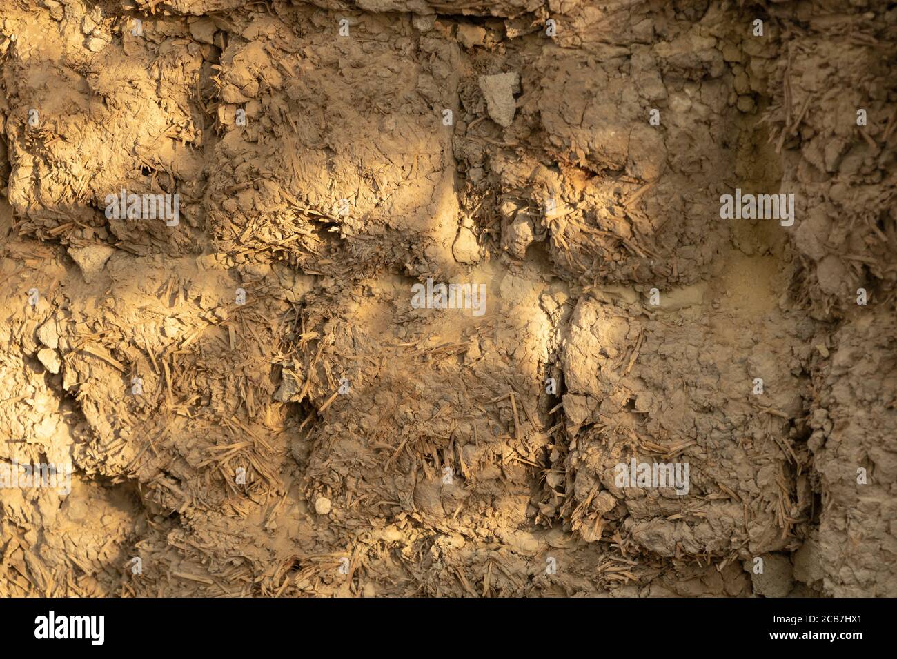 Wall made of clay bricks. Old style construction concept Stock Photo ...