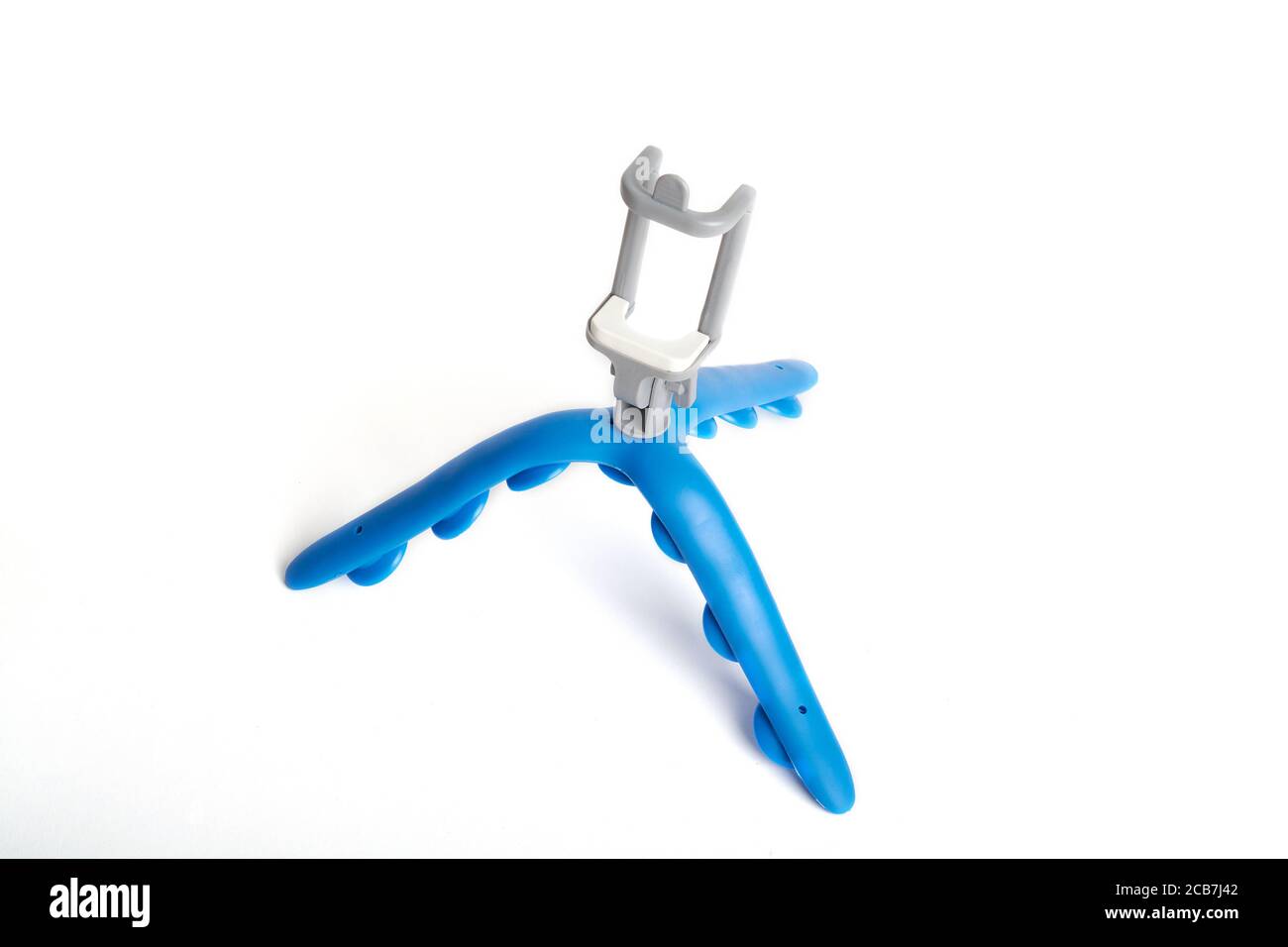 blue tripod tripod made of plastic and blue rubber on a white ...
