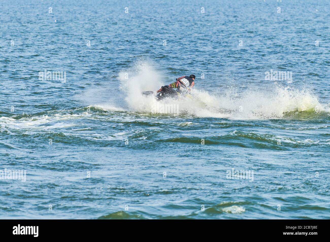 Man on water scooter. Summer vacation on personal watercraft in ...
