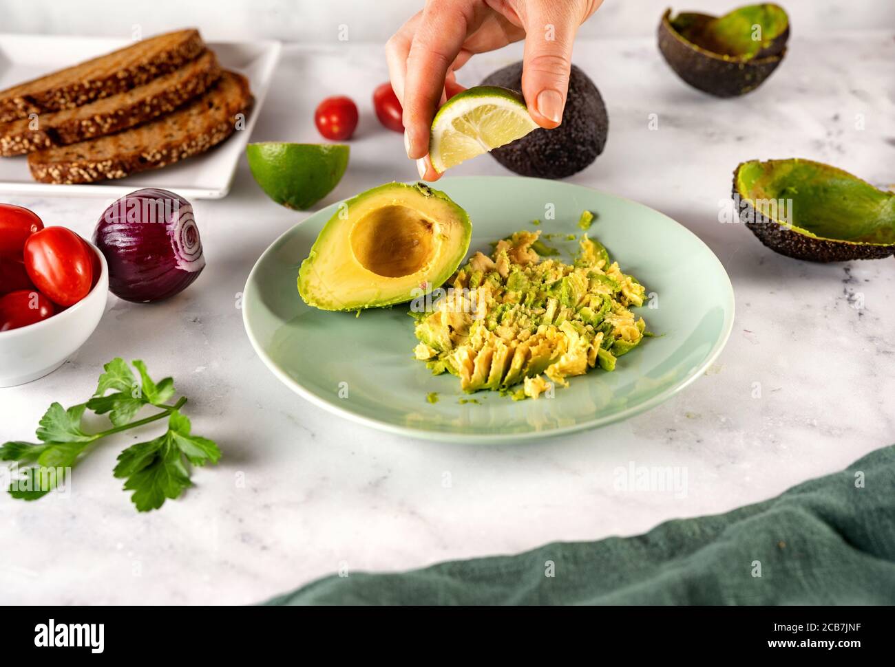 Hand squeezing food hi-res stock photography and images - Alamy