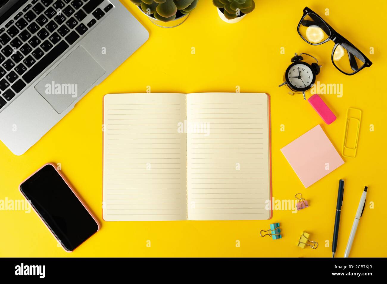 Open laptop with blank notebook, view from above. Workplace concept ...