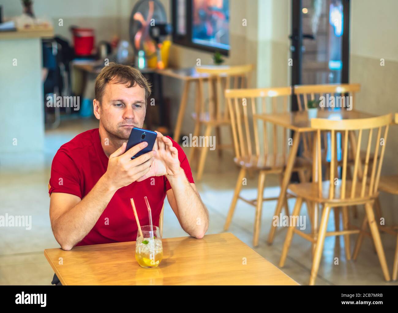 Sad depressed man drinking tea hi-res stock photography and images - Alamy
