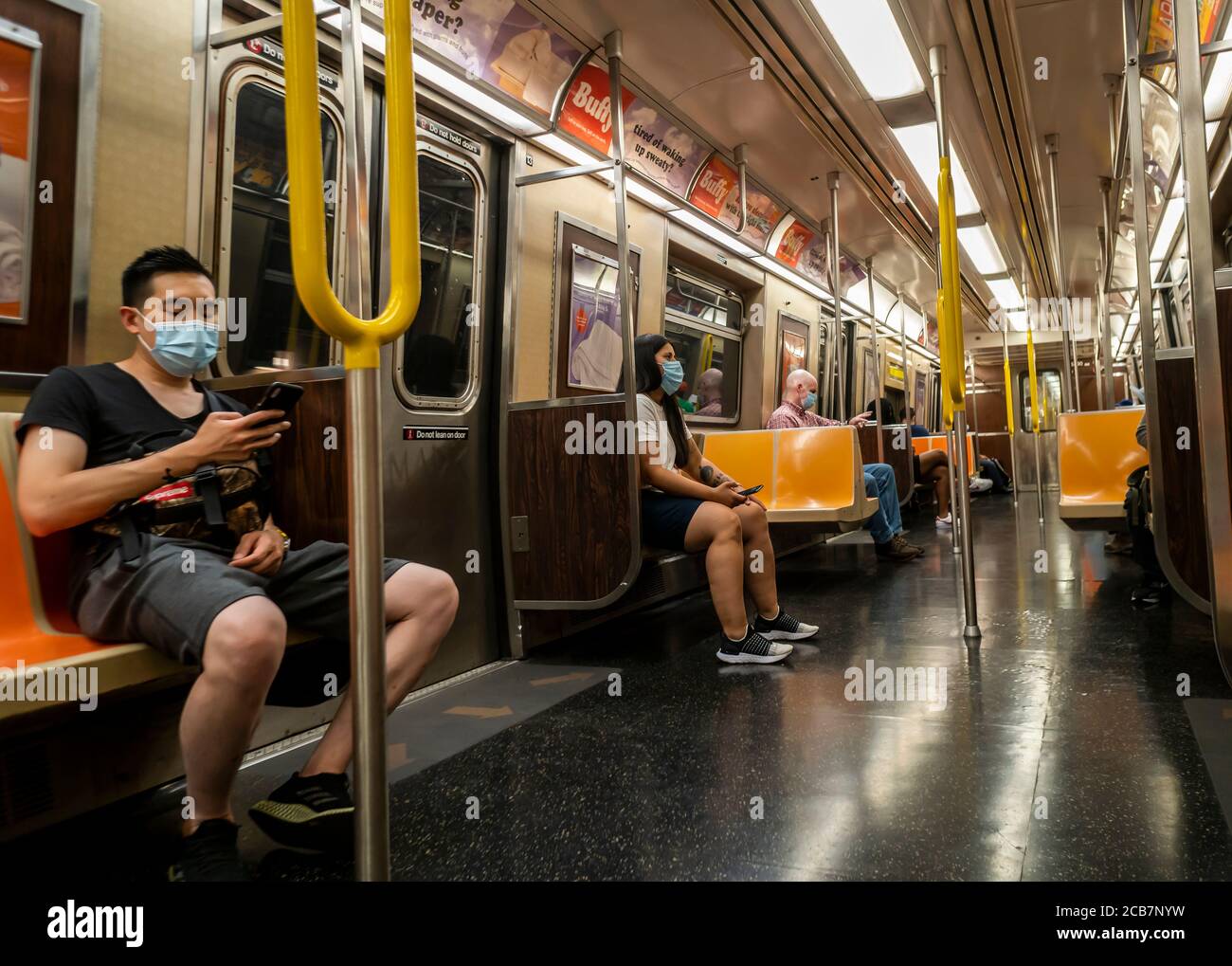 Masked riders on the subway in New York on Saturday, August 8, 2020 ...