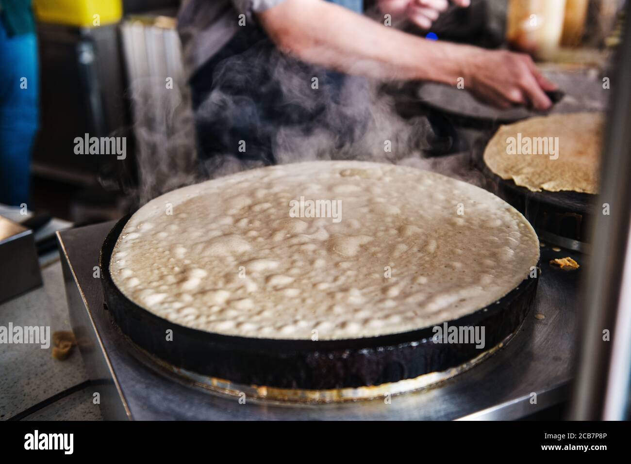 Crepe being made Stock Photo - Alamy