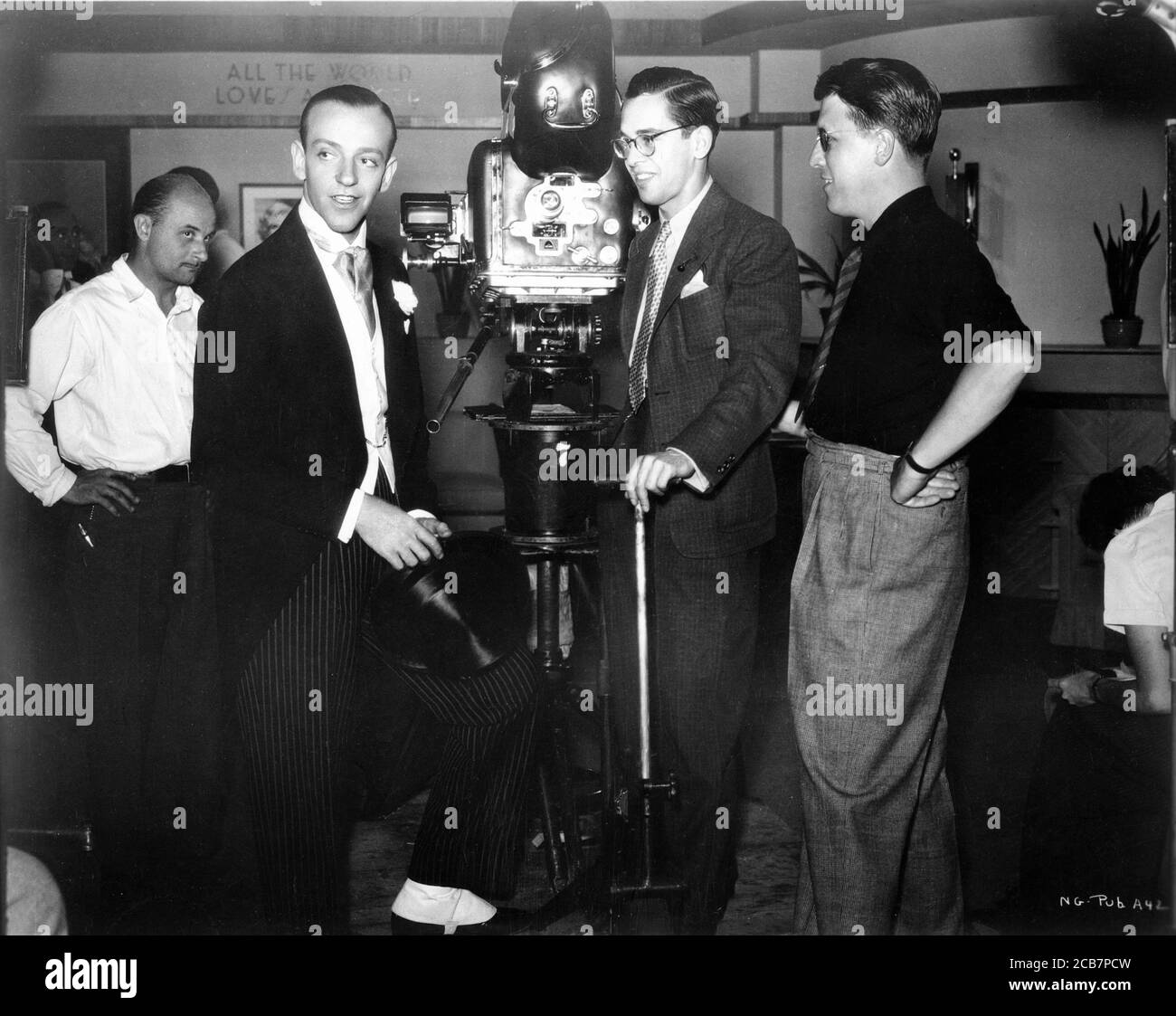 FRED ASTAIRE and Director GEORGE STEVENS on set candid with camera crew ...
