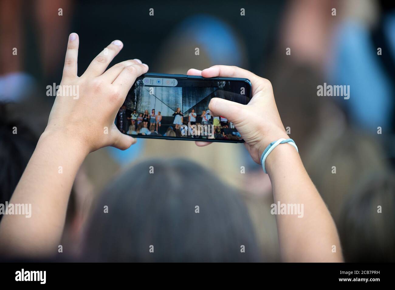 Vilnius, Lithuania. 10th Aug, 2020. A girl takes pictures during a ...