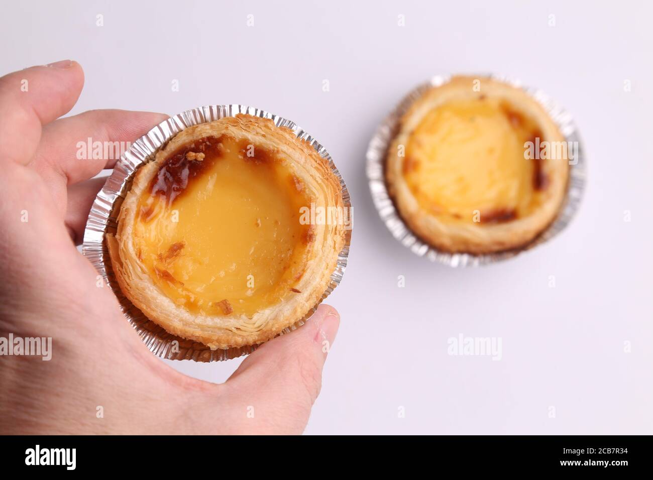 Two egg tarts hi-res stock photography and images - Alamy