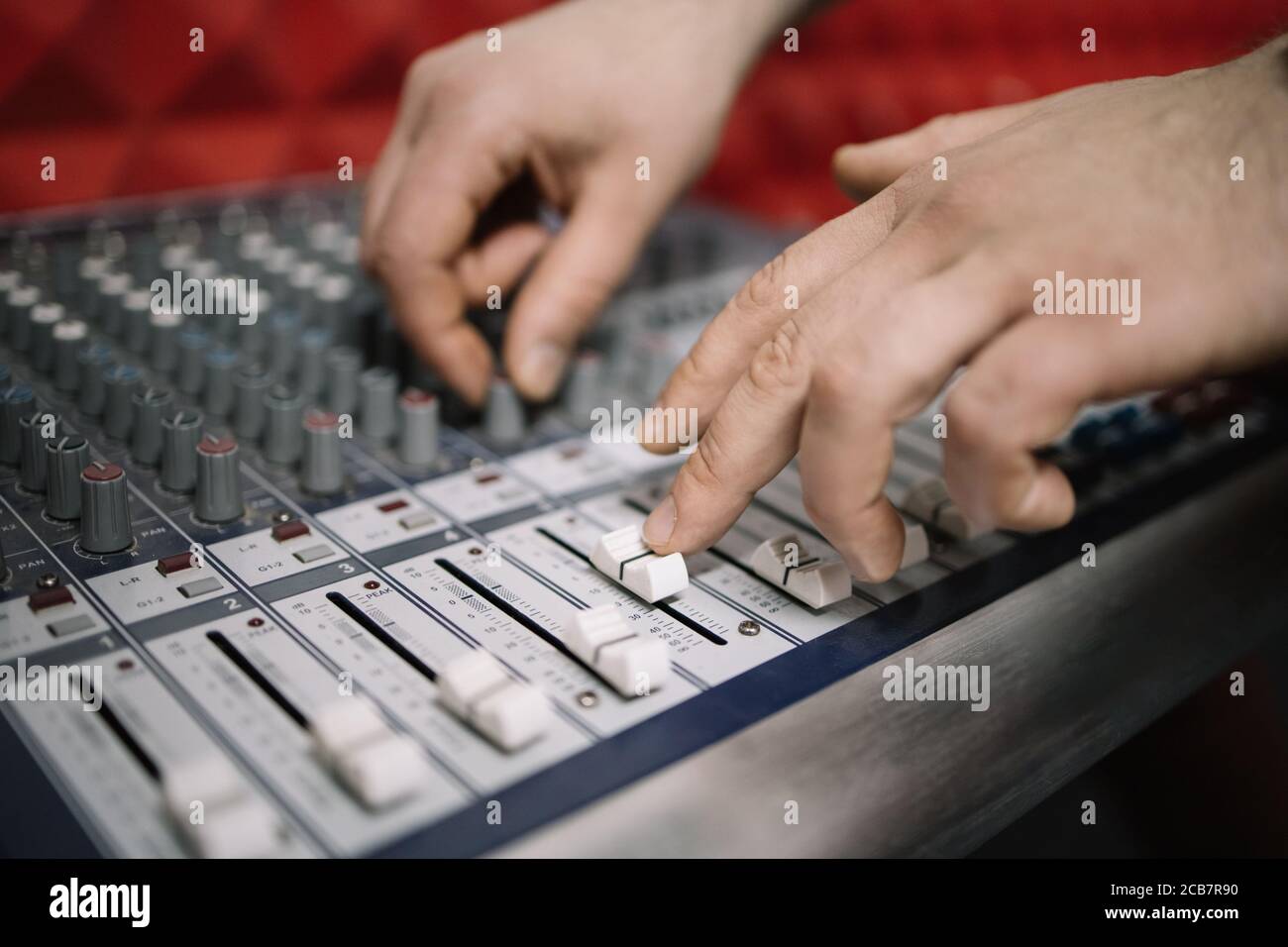Cropped man adjusting channel hi-res stock photography and images - Alamy