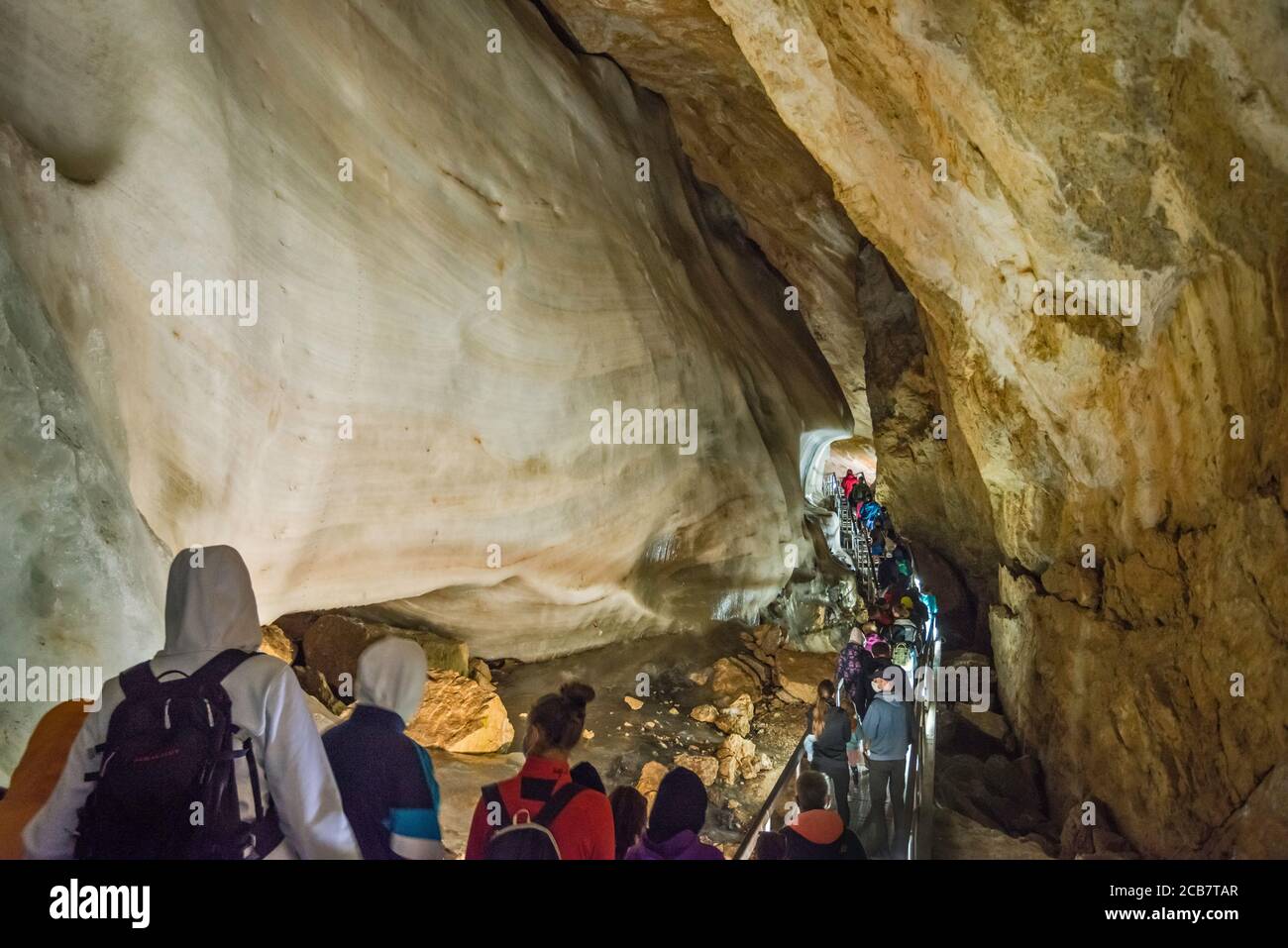 Visitors at underground glacier, Dobsinska Ice Cave, Slovak Paradise ...