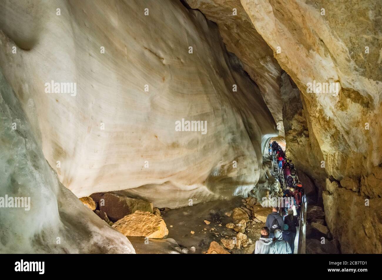 Visitors at underground glacier, Dobsinska Ice Cave, Slovak Paradise ...